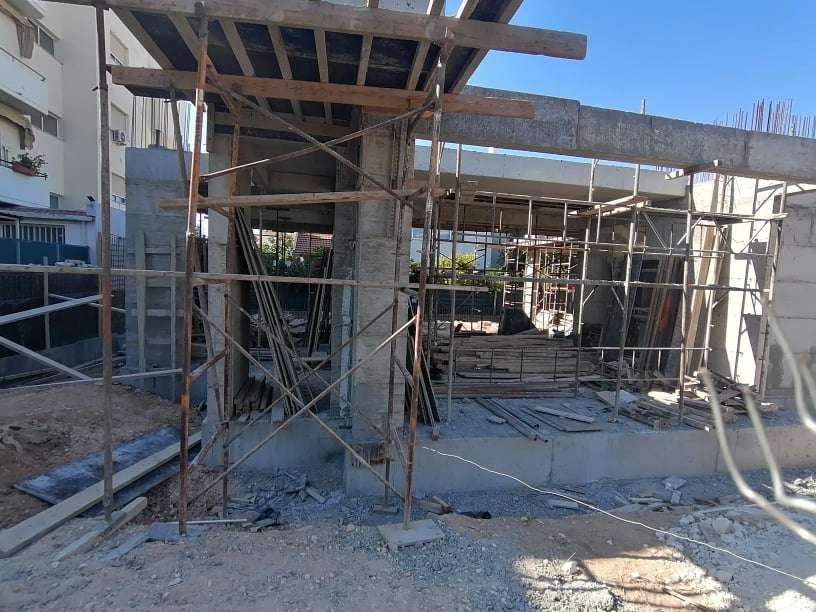 Three Storey Building - Buildia Constructions